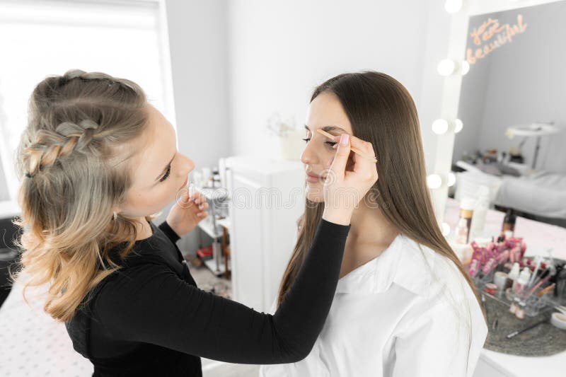The Image Conveys the Moment when the Eyebrow Designer is Working To ...