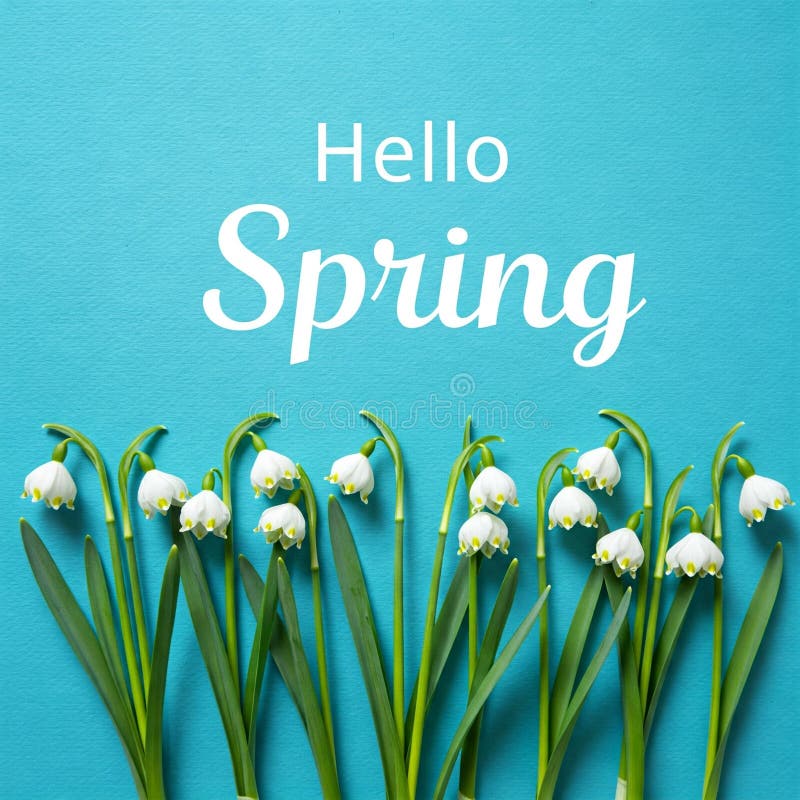 Welcoming Spring: White Flowers and Text on a Bright Blue Stock ...