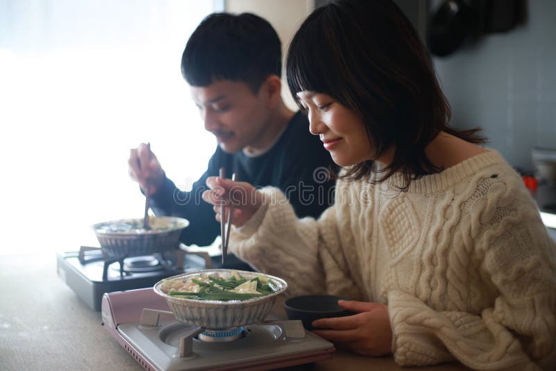 Couple eating a pot stock image. Image of food, home - 241906587