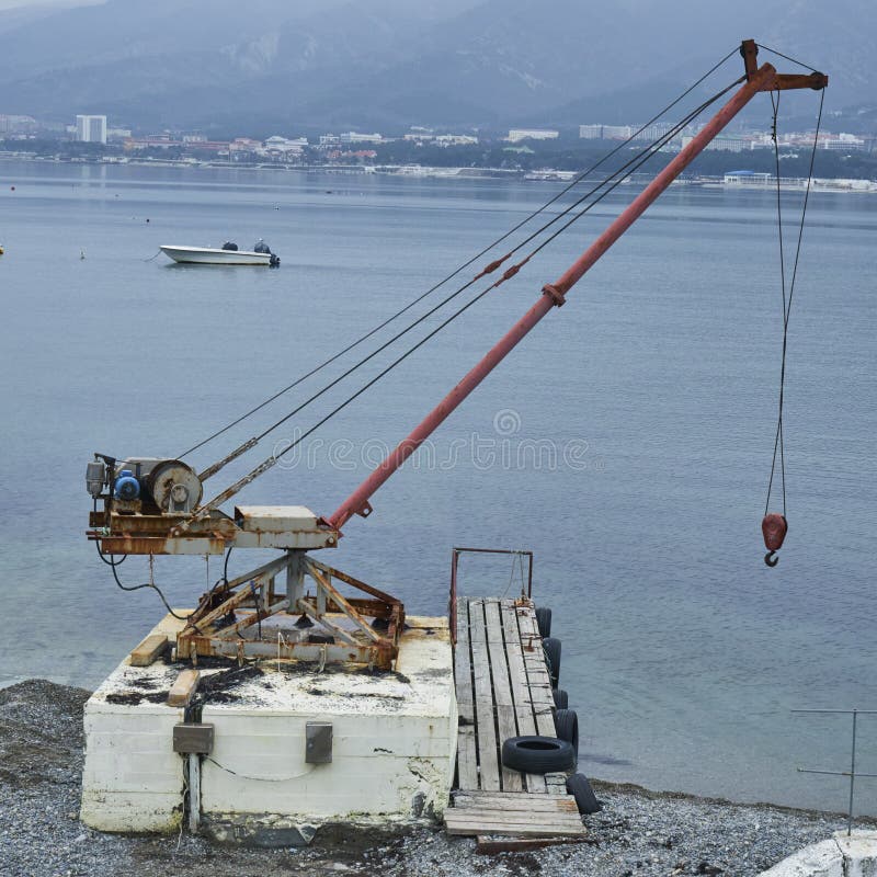 Crane for boats stock photo. Image of flake, quay, motor - 238371658