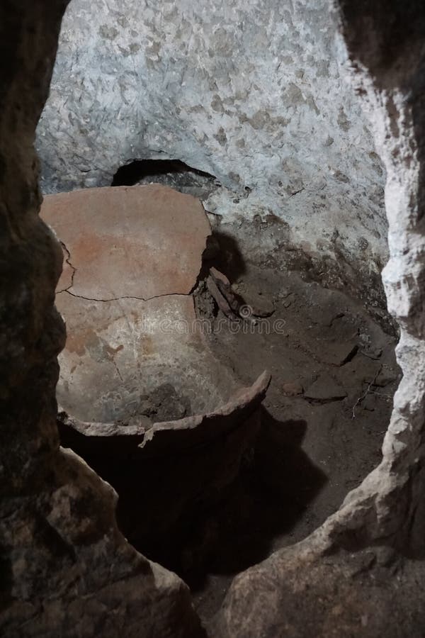 Curious Hole In The Cave With Ruins Ancient Objects Stock Photo - Image ...