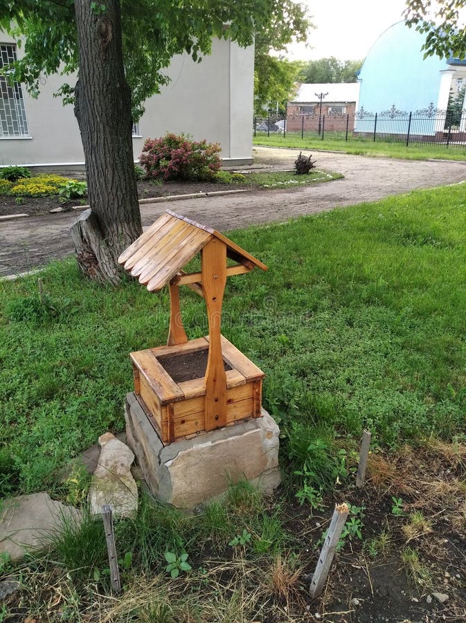 Image of Decorative Wooden Well Stock Image - Image of grass, fixed ...