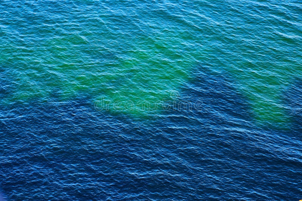 Deep Blue Waters with Ripples on the Surface Featuring Turquoise and ...