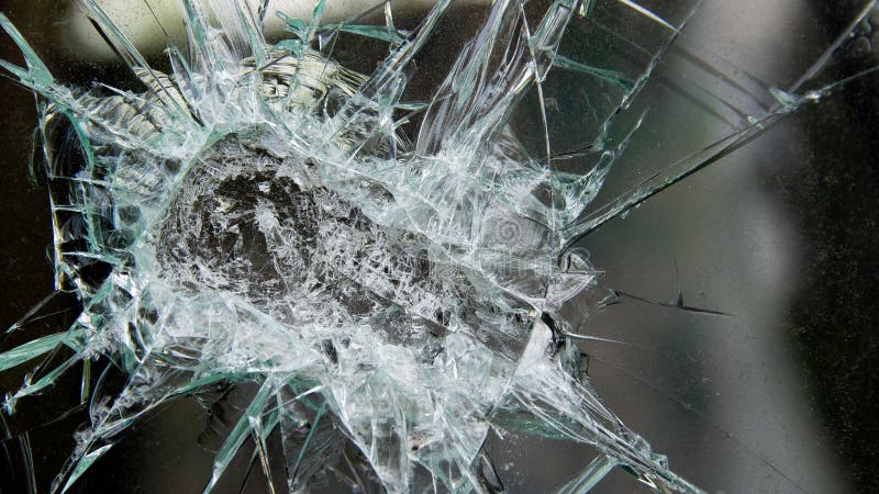 Image Depicting Shattered Glass with a Central Impact Point and ...