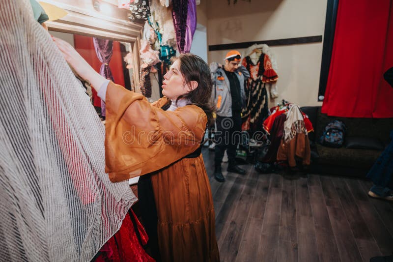 Young Actors Preparing Costumes Backstage in a Vibrant Theater Setting ...