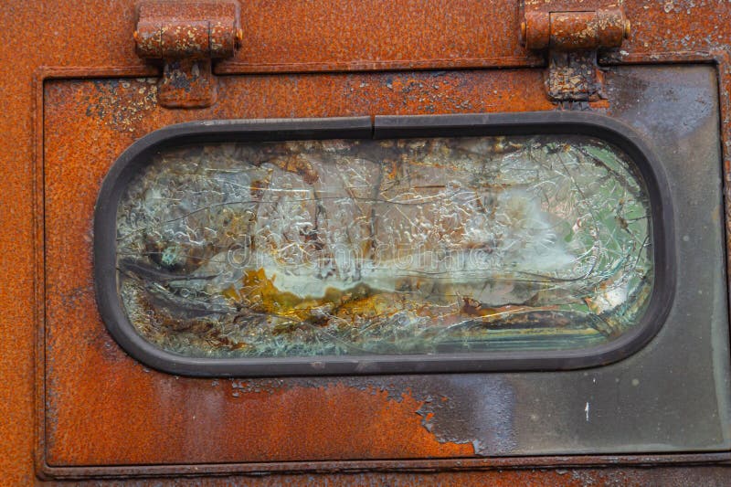 The Image Depicts an Aged, Weathered Object with a Rusted Structure ...