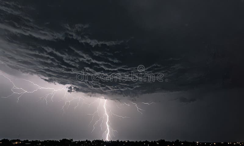 Dramatic Lightning Bolt Streaks Across Dark, Stormy Sky, with Cityscape ...