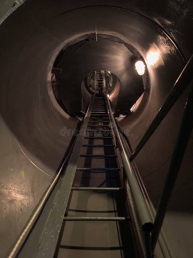 Image Depicts an Interior View of a Metallic, Cylindrical Structure ...