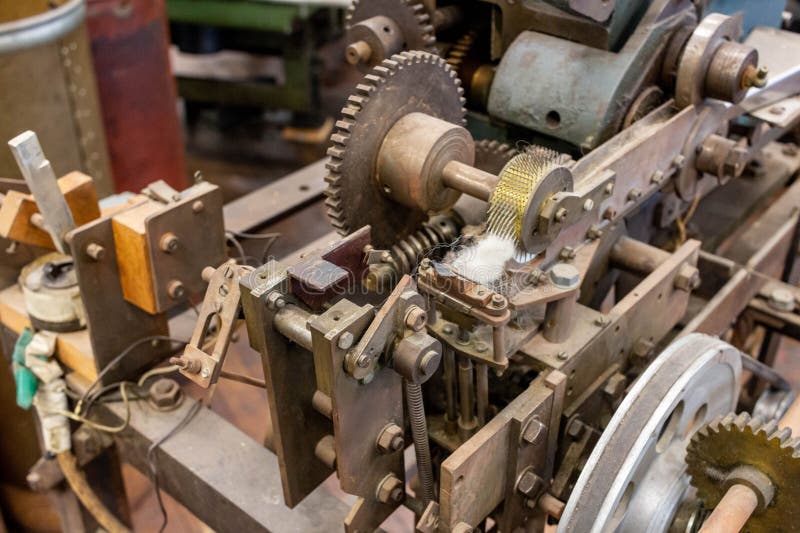 An Old Machine that Has Some Gears on the Sides of it Stock Photo ...