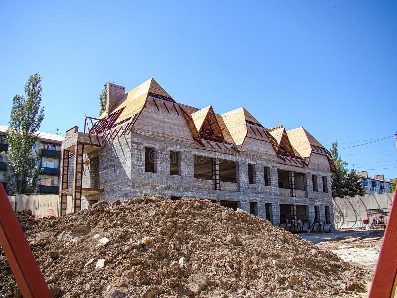 Image Depicts a Partially Built Structure at a Construction Site, with ...