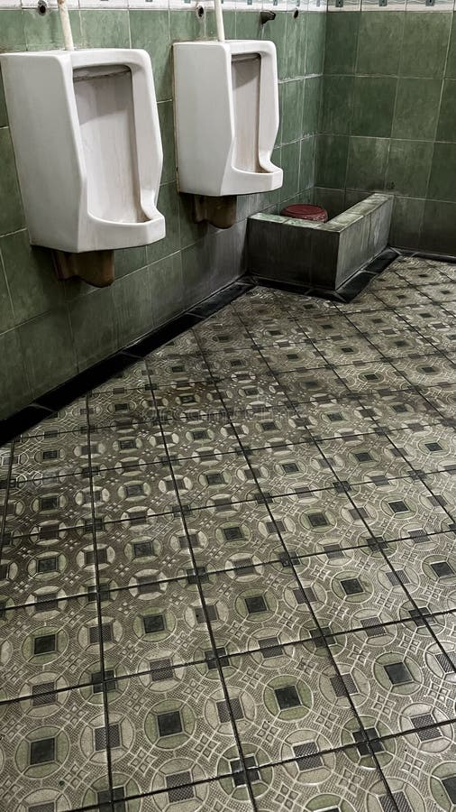 Restroom with Green Tiled Walls Stock Image - Image of floor, furniture ...