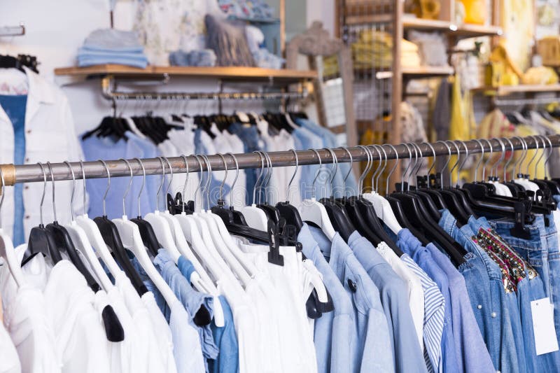 Different Colored Clothes in the Modern Shopping Centre Stock Image ...