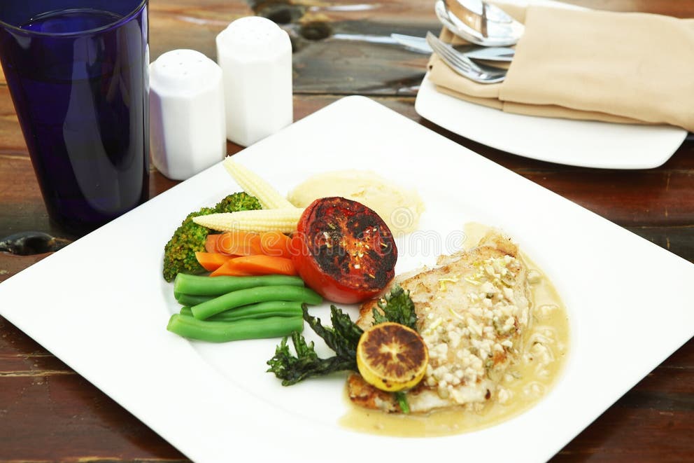 Gourmet Fish Fillet with Coconut Pan Sauce. Roasted Vegetables. Mashed ...