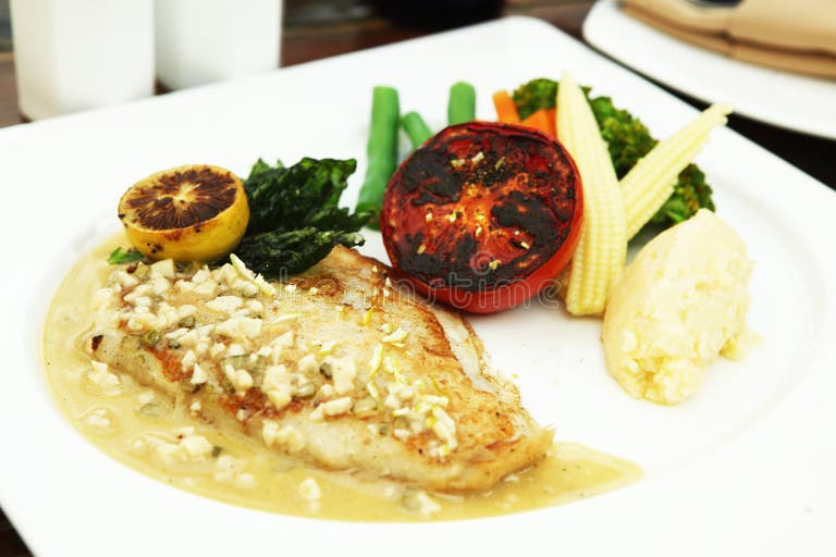 Gourmet Fish Fillet with Coconut Pan Sauce. Roasted Vegetables. Mashed ...