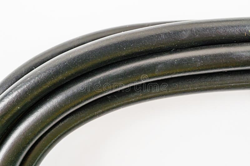 Image Displays a High-quality, Dark Coiled Wire Cable that Contrasts ...