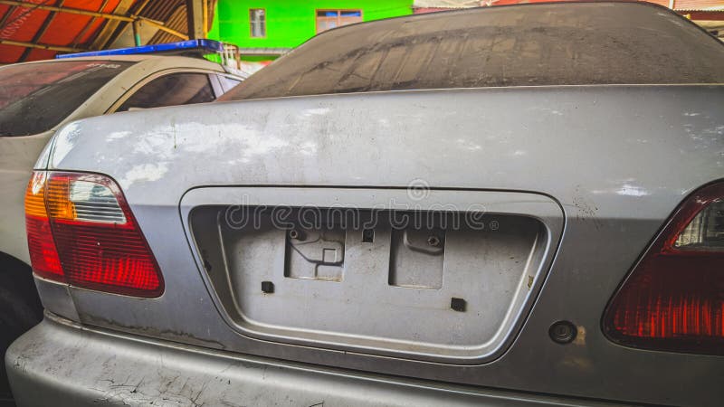 Rear View of a Dusty Car with Missing License Plate Stock Photo - Image ...