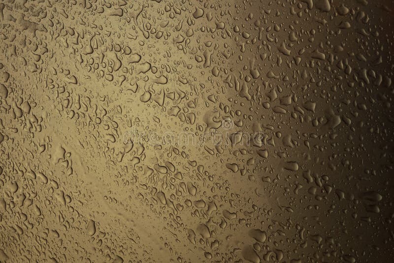Image Drops of a Water on a Bronze Metal Surface Stock Image - Image of ...