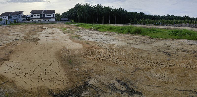An Empty Plot of Land Scene Besides a Residential Row of Houses. Stock ... An Empty Plot of Land Scene Besides a Residential Row of Houses. Stock ...