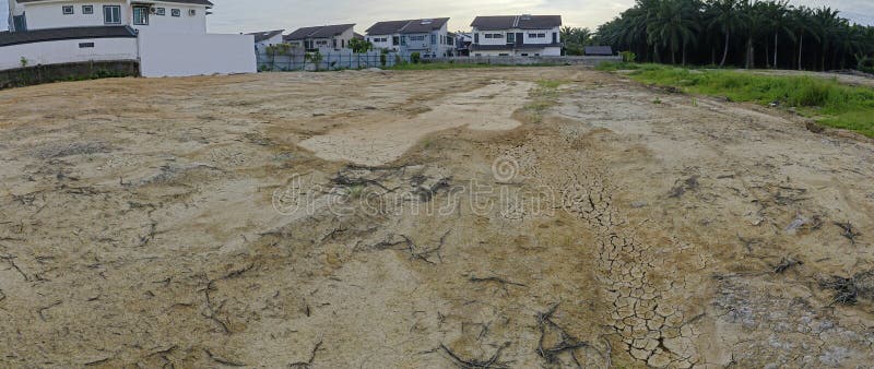 An Empty Plot of Land Scene Besides a Residential Row of Houses. Stock ... An Empty Plot of Land Scene Besides a Residential Row of Houses. Stock ...