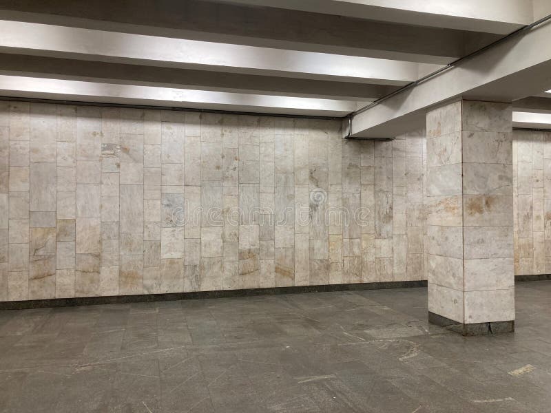 Image of an Empty Room with a Tiled Wall, Dark Floor, Black Wire on ...