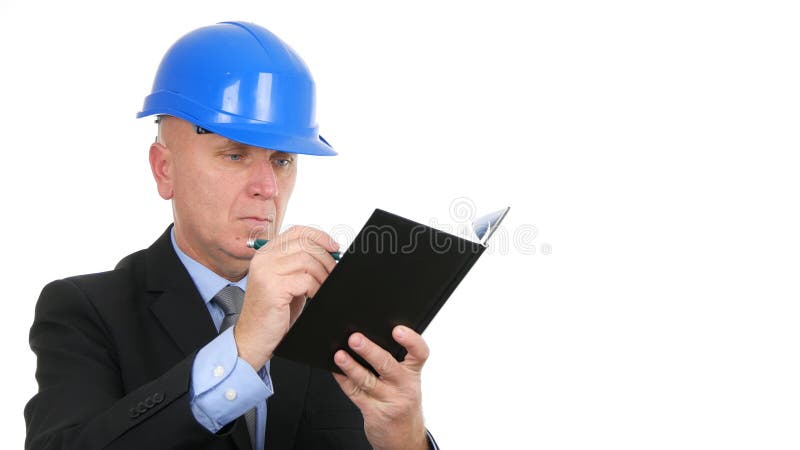 Image with Engineer Reading and Writing in Agenda Technical Notes Stock ...