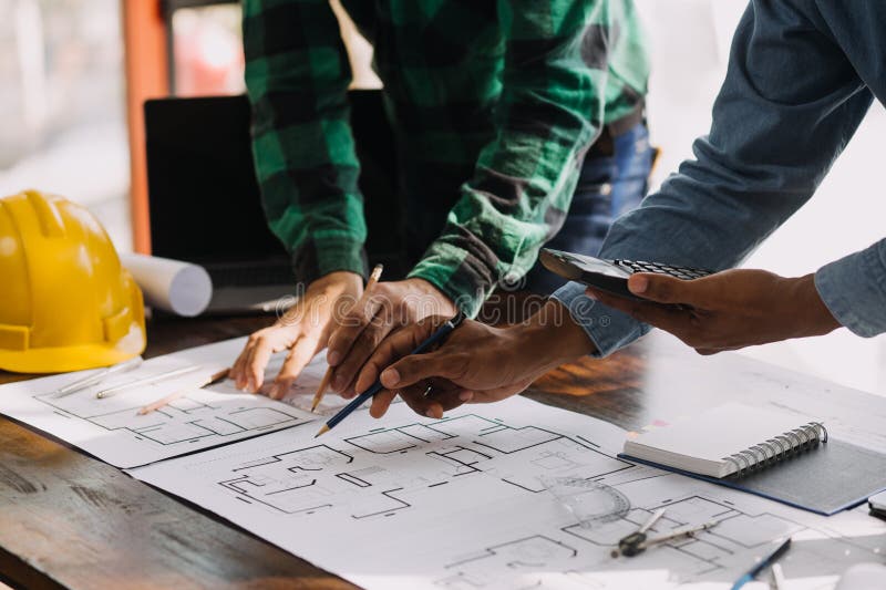 Image of Engineering Objects on Workplace with Three Partners ...