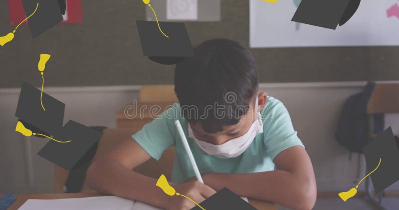 Image of Falling Academic Cap Over Boy Wearing Face Mask Sitting in ...