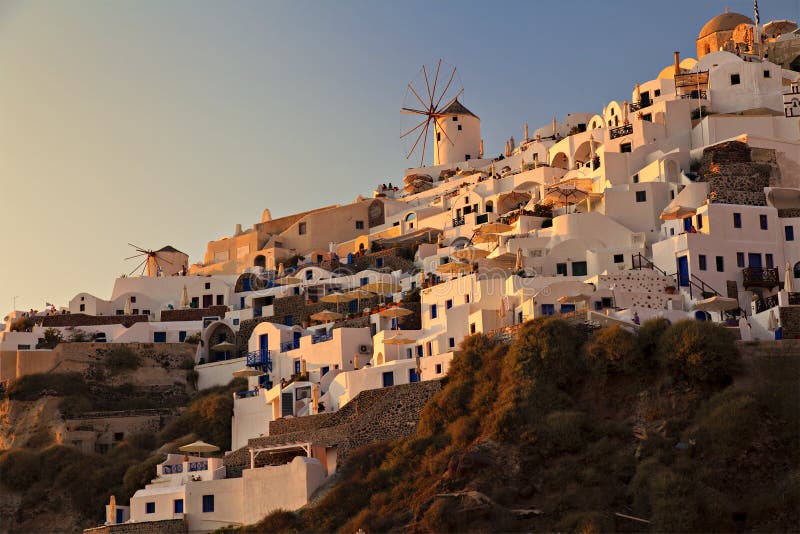 Sunset over Santorini stock photo. Image of cliff, picturesque - 30175440