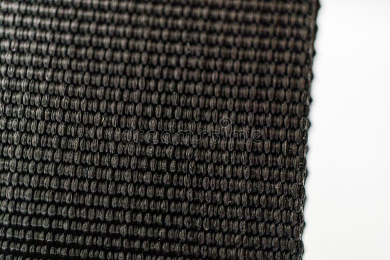 This Image Features a Close-up of High-quality, Dark Fabric with an ...