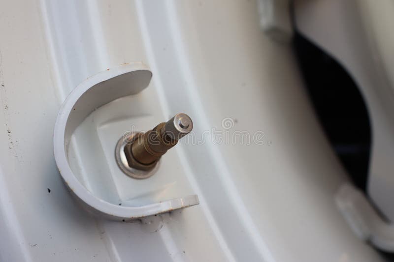 This Image Features a Closeup View of a Valve Stem Located on a ...