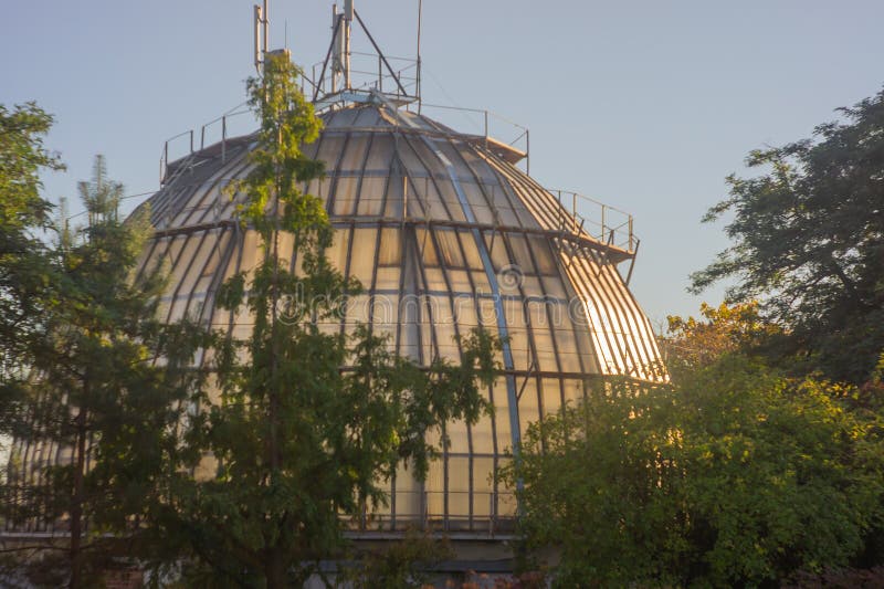 The Image Features a Large, Domed Structure with Multiple Levels of ...