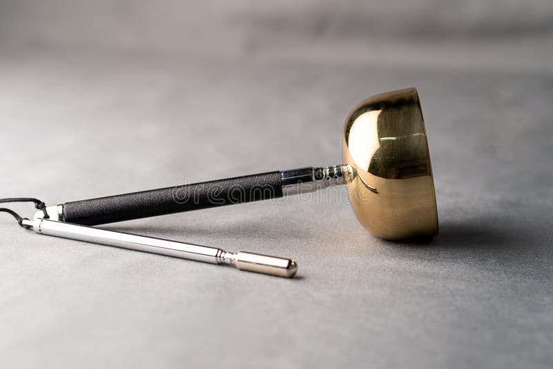 A Brass-Colored Extendable Buddhist Inverted Bell Stock Photo - Image ...