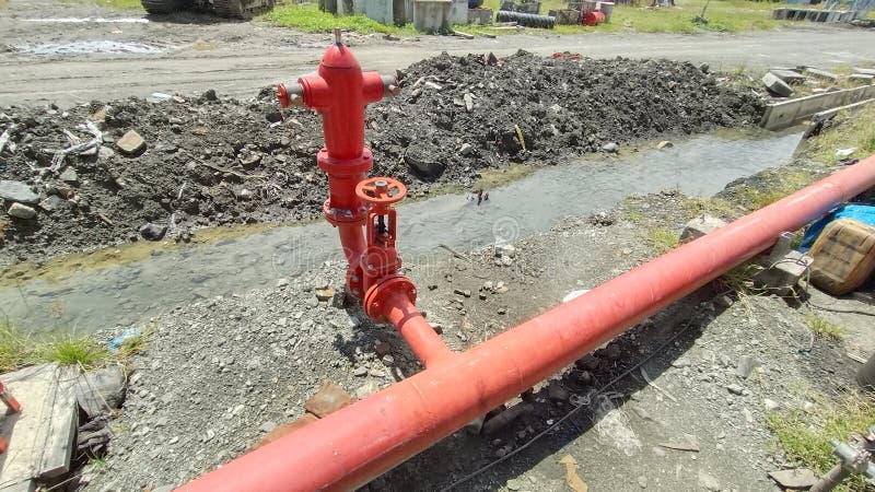 Red Fire Hydrant and Piping System in Construction Area Stock Image ...