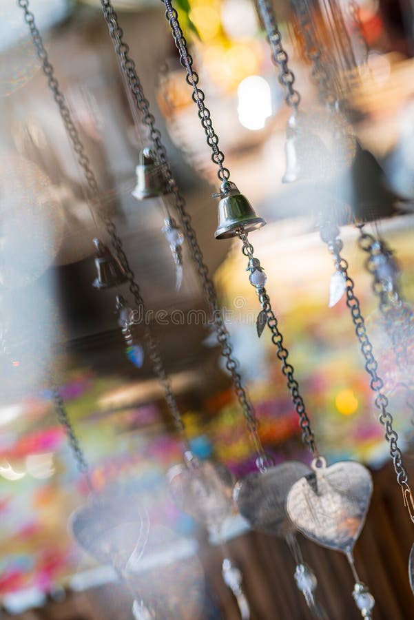 Small Bells Dangle from Chains Stock Photo - Image of dangle, buddha ...