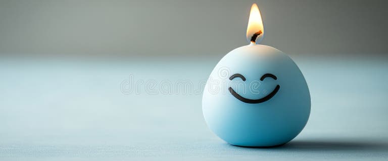 The Image Features a Smiling Candle, Its Flame Aglow, Positioned on a ...