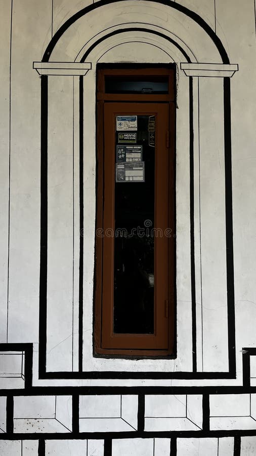 This Image Features a Tall, Narrow Window Framed in Brown, Set within a ...