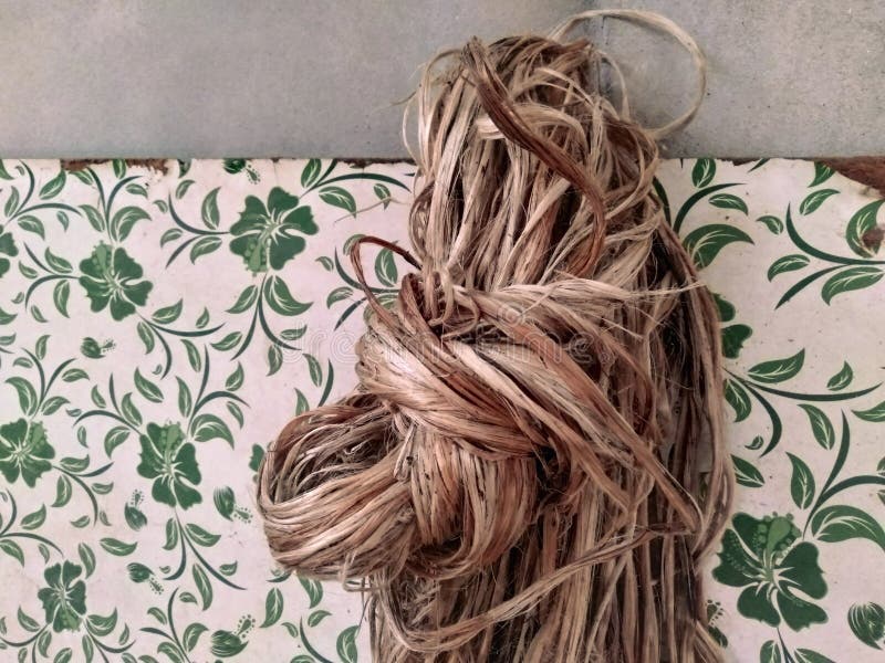 The Image Features a Tangled Ball of Yarn, Which is Tied in a Knot ...