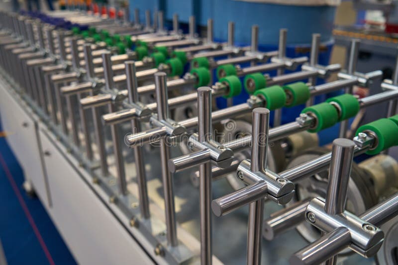 The Image of the Feed Rollers of a Woodworking Machine. Stock Photo ...