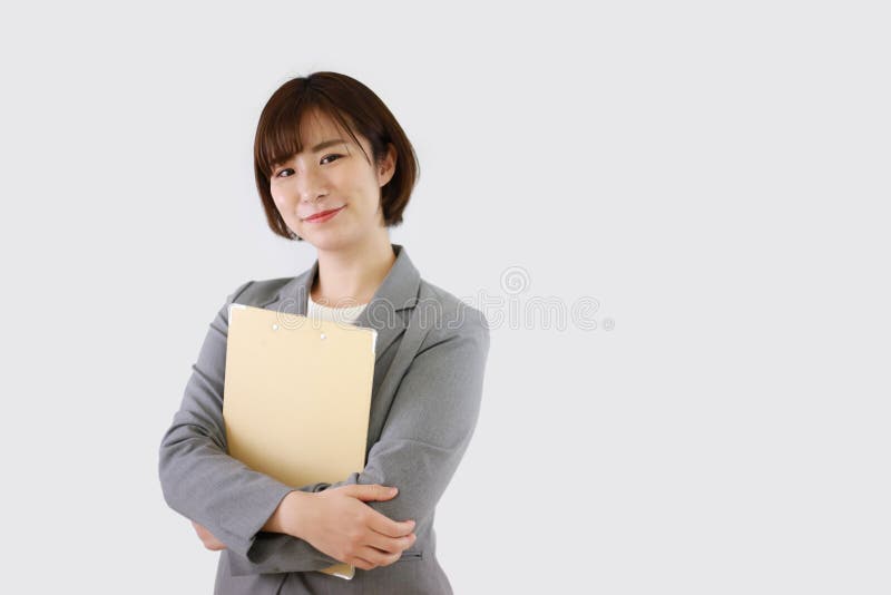 Female Employee with a Binder Stock Photo - Image of businessman, file ...