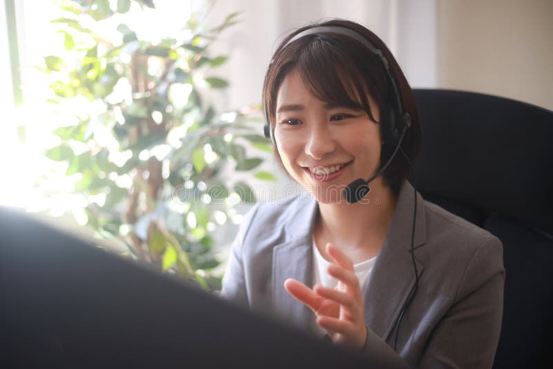 Female Employee Making a Video Call Stock Image - Image of beautiful ...