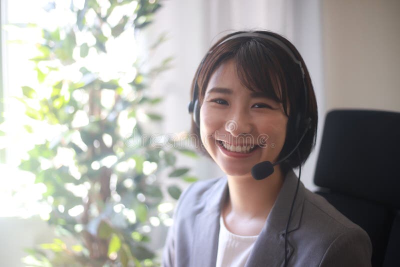 Female Employee Making a Video Call Stock Photo - Image of body ...