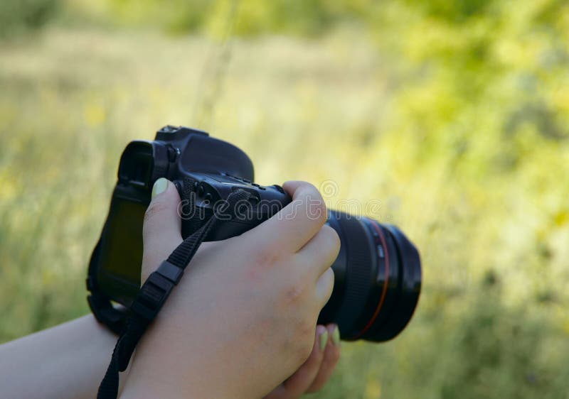 Image of Female Hands with a Camera. Stock Photo - Image of garden ...