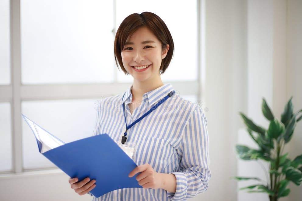 Female Office Worker with a File Stock Photo - Image of name ...