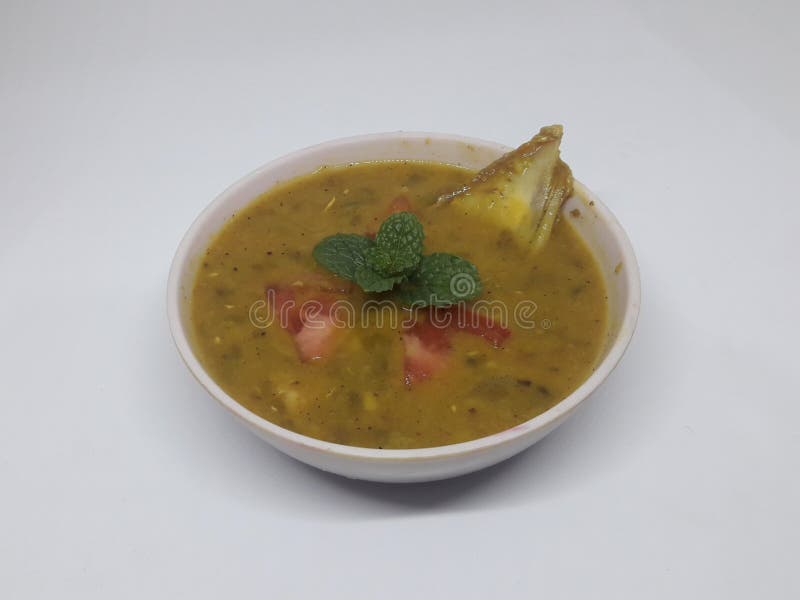 This is an Image of Fish Head Cooked in Fried Yellow Lentil. Stock ...
