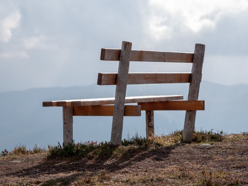 Image with Focus of Bench with Mountains in the Background Stock Image ...