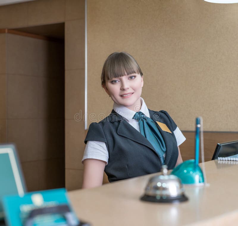 Hotel Reception. Image of Pretty Hostess and Guest Stock Photo - Image ...