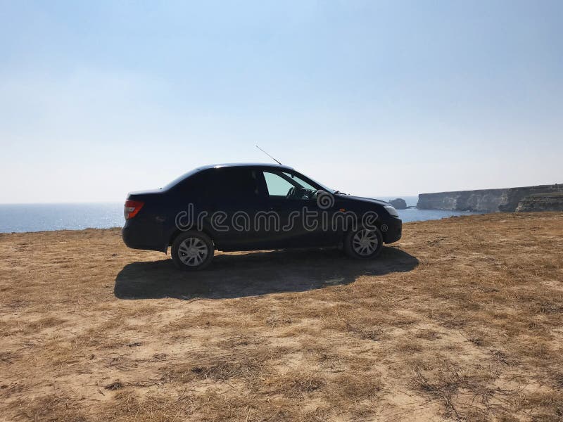 The Image in Front of the Sports Car Scene Behind As the Sun Going Down ...