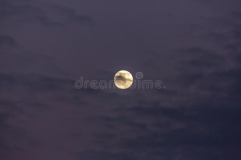 Image of Full Moon Against Colorful Evening Sky with Light Clouds Stock ...