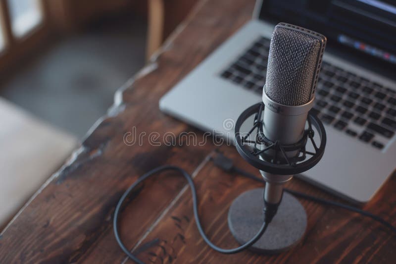 Ultimate Podcasting Setup with High-Quality Microphone and Laptop Stock ...