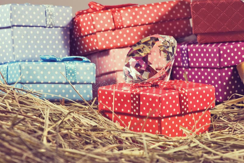 Image of Gift Boxes in the Hay Closeup Stock Image - Image of closeup ...